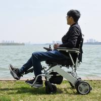 China 6km/h Handicapped Folding Lightweight Portable Wheelchair for sale