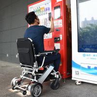 China Folding 6Km/H Lightweight Motorized Wheelchair 100kg Load for sale