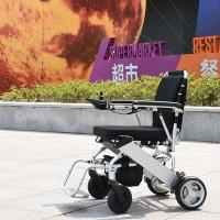 China Folding 6Km/H Lightweight Motorized Wheelchair 100kg Load for sale