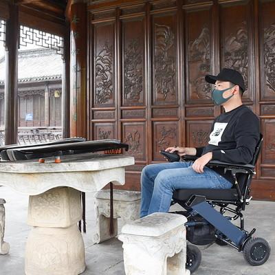 China Lightweight Portable Wheelchair For The Elderly And Disabled for sale
