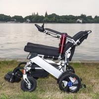 China 275.58lbs 47.40lbs Multifunction Foldable Electric Wheelchair for sale