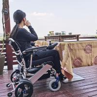 China Multifunction Handicapped 300W Battery Electric Wheelchair for sale