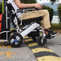 China Manual Mag Wheels Brushless 18KM Multifunction Foldable Electric Wheelchair for sale