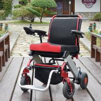 China Brush Motor Light Foldable Electric Wheelchair With Rigid PU Tyre for sale