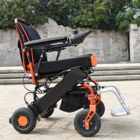 China Brush Motor Light Foldable Wheelchair With Rigid PU Tyre 6km/H for sale