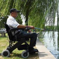 China Brushless Motor ISO13485 18 KG 30KM Aluminium Folding Wheelchair for sale