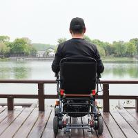 China Lightweight Electric Foldable Wheelchair With Lithium 100KG Load for sale