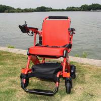 China Red Lightweight Compact Wheelchair Foldable Maximum 6km/H for sale