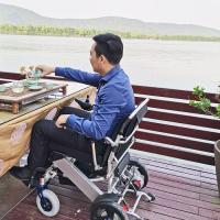 China 6 Km/H ISO13485 Multifunction Foldable Electric Wheelchair for sale