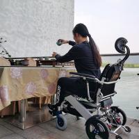 China Handicapped Armrest Liftable Lightweight Electric Wheelchair for sale