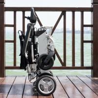 China Handicapped Travel Lightweight Folding Electric Wheelchair for sale