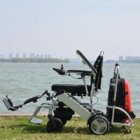China Portable Foldable Lightweight Motorized Wheelchair With Ultra Strong Frame for sale