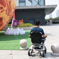 China Aluminum Frame 6 Km/Hr Foldable Power Wheelchair With Brushless Motor for sale