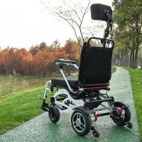 China Lightweight Lithium Battery Foldable Wheelchair 6km/H With Lamp for sale