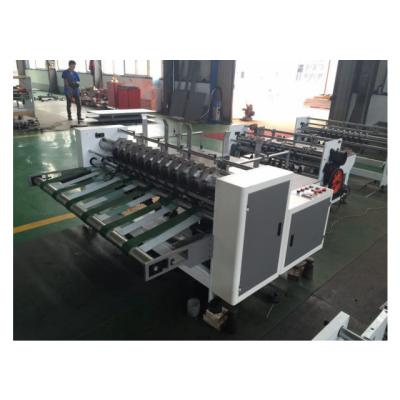 China 1200mm Computerized Partition Slotter Assembly Corrugated Carton Box Machine for sale