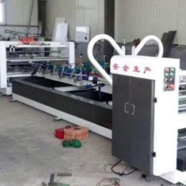 China 1200*700mm Carton Folding And Gluing Machine For Boxes 7.5KW for sale