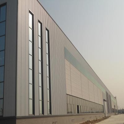 China Large Span Steel Frame Building Systems with 50-70 Year Service Life and Q235B/Q355B Steel Grades for sale