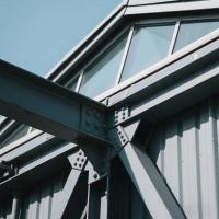 China Hot Rolled Steel Frame Building with Sliding or Rolling Door - Q235/Q345 Steel - Custom Spans Available for sale