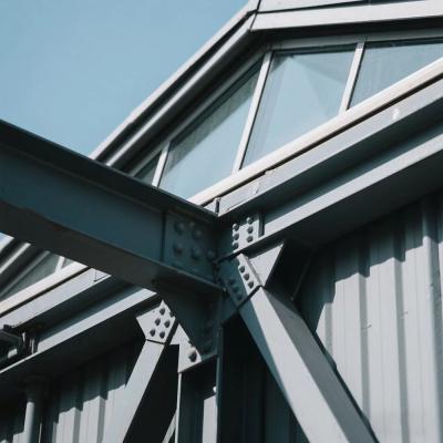 China Hot Rolled Steel Frame Building with Sliding or Rolling Door - Q235/Q345 Steel - Custom Spans Available for sale