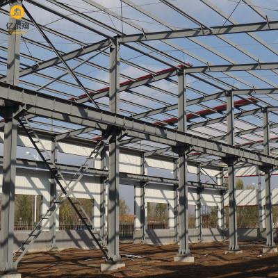 China Prefabricated Steel Warehouse Building with Q355 Steel Structure, Wide Span Workshop Design for Industrial Applications for sale
