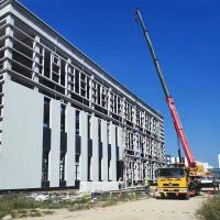 China Custom Steel Frame Workshop with Grade 7 Earthquake Resistance and Sliding Door - Industrial Prefabricated Building for sale