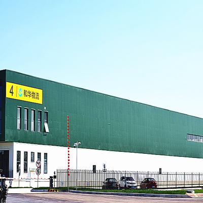 China Prefab Steel Warehouse Building with 50-Year Lifespan - Custom Sizes, Wind & Snow Load Rated for sale