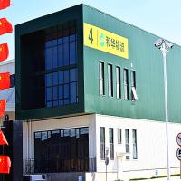 China Custom Q355B Steel Commercial Building for 4S Shops and Showrooms with Glass Curtain Walls and Sandwich Panel Construction for sale
