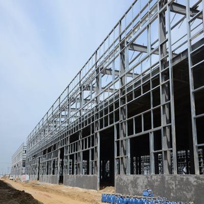 China Prefabricated Steel Frame Warehouse Building - 30,000 Ton Annual Capacity, Custom Industrial Structures with Q235B/Q355B Steel for sale