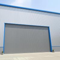 China Steel Structure Warehouse Q235B Steel Customized Snow Load Capacity Steel Door for sale