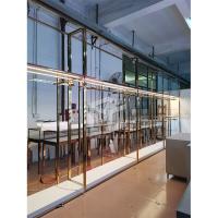 China Electroplate Steel Boutique Clothing Display Stands With T5 Lighting for sale