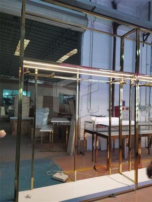 China Electroplate Steel Boutique Clothing Display Stands With T5 Lighting for sale