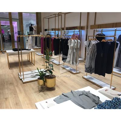 China ODM Boutique Women Clothing Shop Display Furniture Racks 5mm Thick for sale