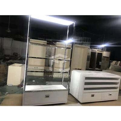 China MDF Handbag Store Display Stand 8mm Tempered Glass Bag Shop Decoration for sale