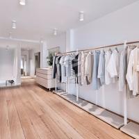 China MDF Clothes Display Stand garment Store Furniture Installation Service for sale