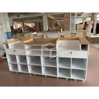 China Modern Custom Ladies Garment Shop Display Counter Stainless Steel Material for sale