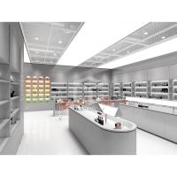 China Fancy Skincare Display Shelves Name Makeup Shops Furniture With Led Light for sale