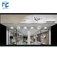 China Black Golden Color Wooden Clothes Display Rack For Shop Interior Design for sale