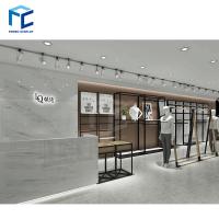 China Black Golden Color Wooden Clothes Display Rack For Shop Interior Design for sale