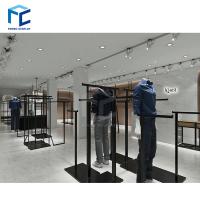China Black Golden Color Wooden Clothes Display Rack For Shop Interior Design for sale