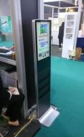 China Black 21.5 Inch Floor Standing Digital Signage With Magazine Newspaper Shelf for sale