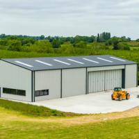 China Q355 Welded H Section Steel Structure Warehouse 40-50 Year Lifespan Prefabricated Building for sale