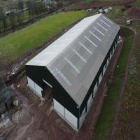 China Prefab Steel Structure Farm Shed for Goat Sheep Chicken House 50 Year Lifespan 70m Clear Span for sale