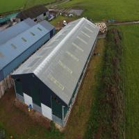 China Q235B Q355B Heavy Duty Light Steel Structure Farm Buildings Poultry Houses 70m Span for sale