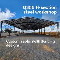 China Heavy Duty Steel Structure Workshop with Roll-up Door and Crane Beam System 8.0 Earthquake Resistant for sale