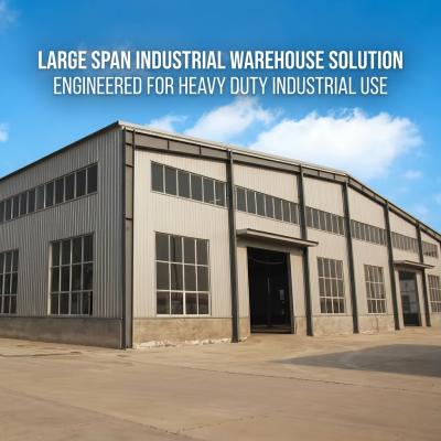 China ASTM A36 H Beam Steel Structure Workshop 60m Clear Span Hot Dip Galvanized Factory Building for sale