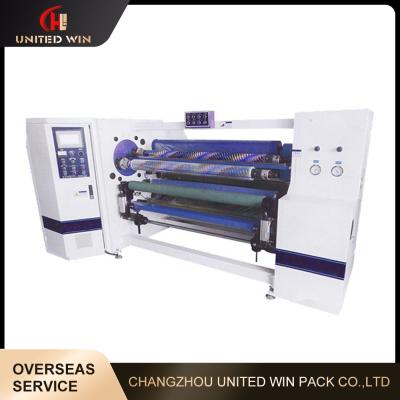 China Double Shaft Exchange Tape Rewinding Machine BOPP Jumbo Roll Packing Tape for sale