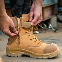 China Wheat Cowhide Rubber Sole Glass Fiber Toe Security Guard Work Boots Anti Smashing Kevlar Anti-Proof Work Shoes for sale