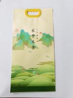 China Moderate Thickness Composite Paper Poly Bag Capacity 5kg With Handle for sale