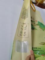 China Moderate Thickness Composite Paper Poly Bag Capacity 5kg With Handle for sale