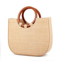 China Women's Bag Woven With Grass And Wooden Handle For Leisure Featuring Fashion Designs for sale